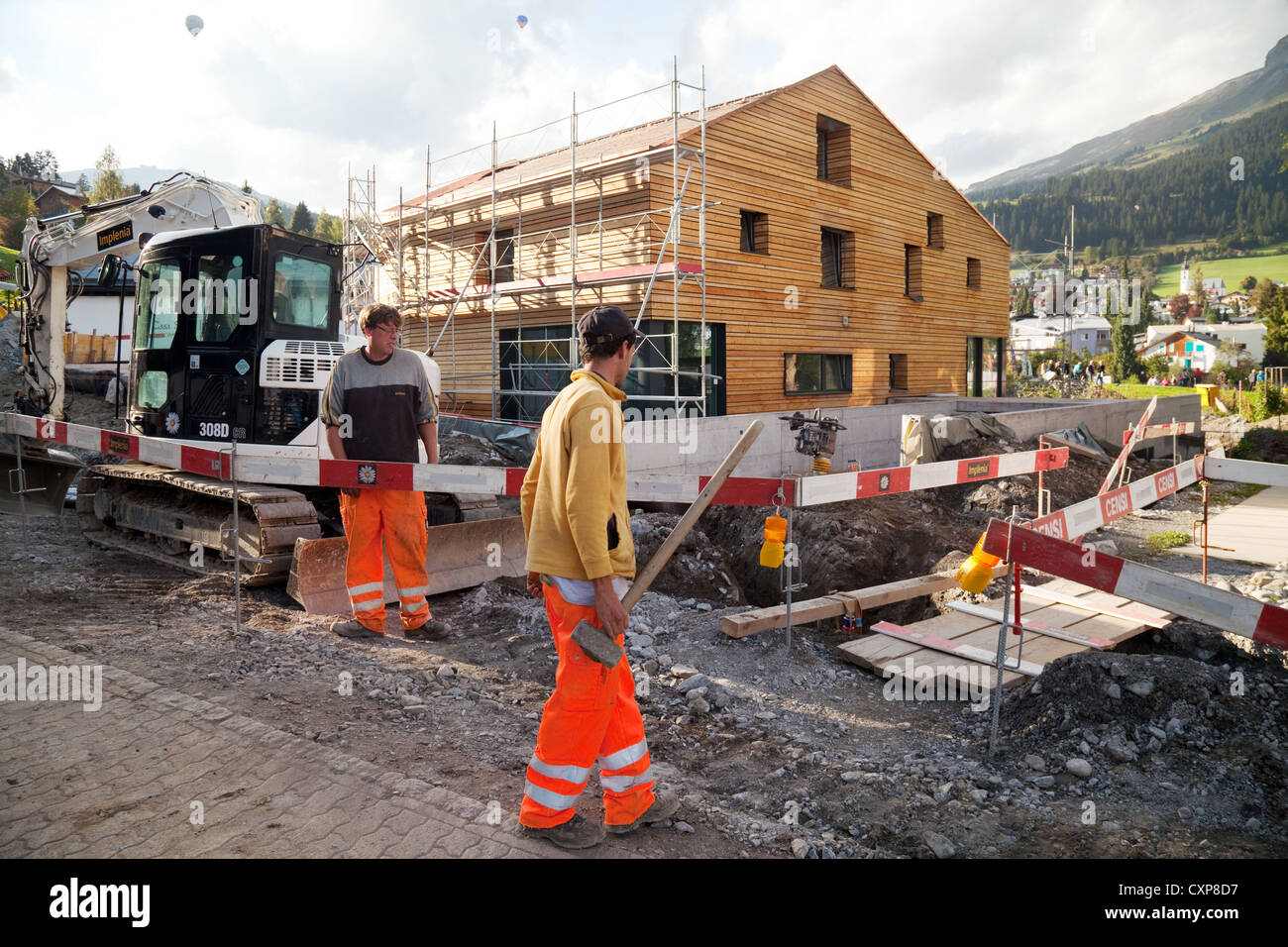 Swiss building construction workers building new houses, Flims ...