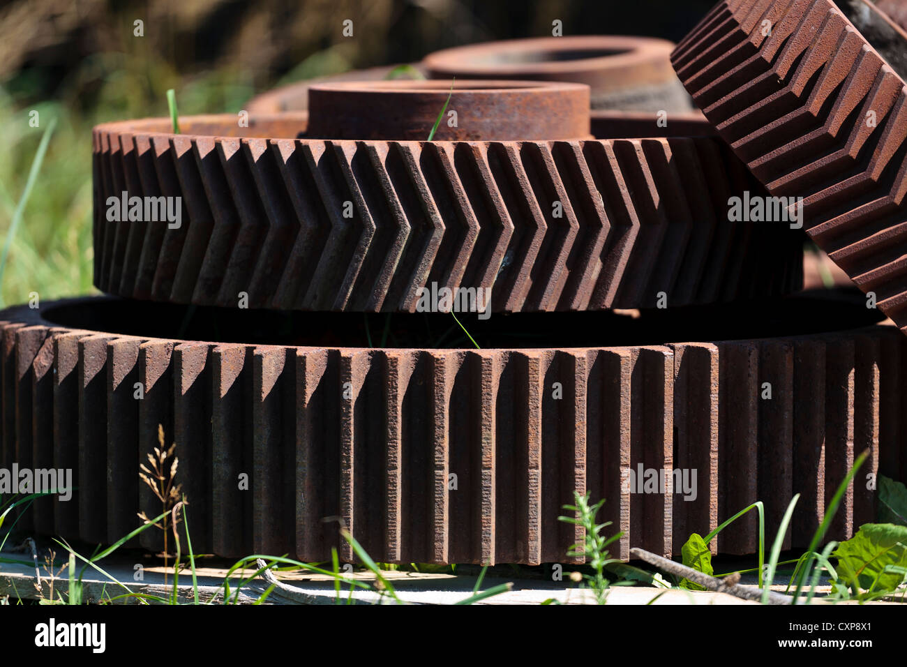 Large gear parts in storage Stock Photo - Alamy