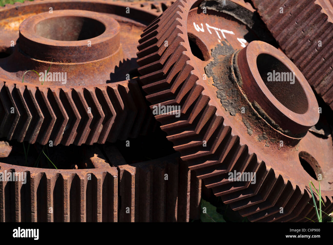 Large gear parts in storage Stock Photo - Alamy
