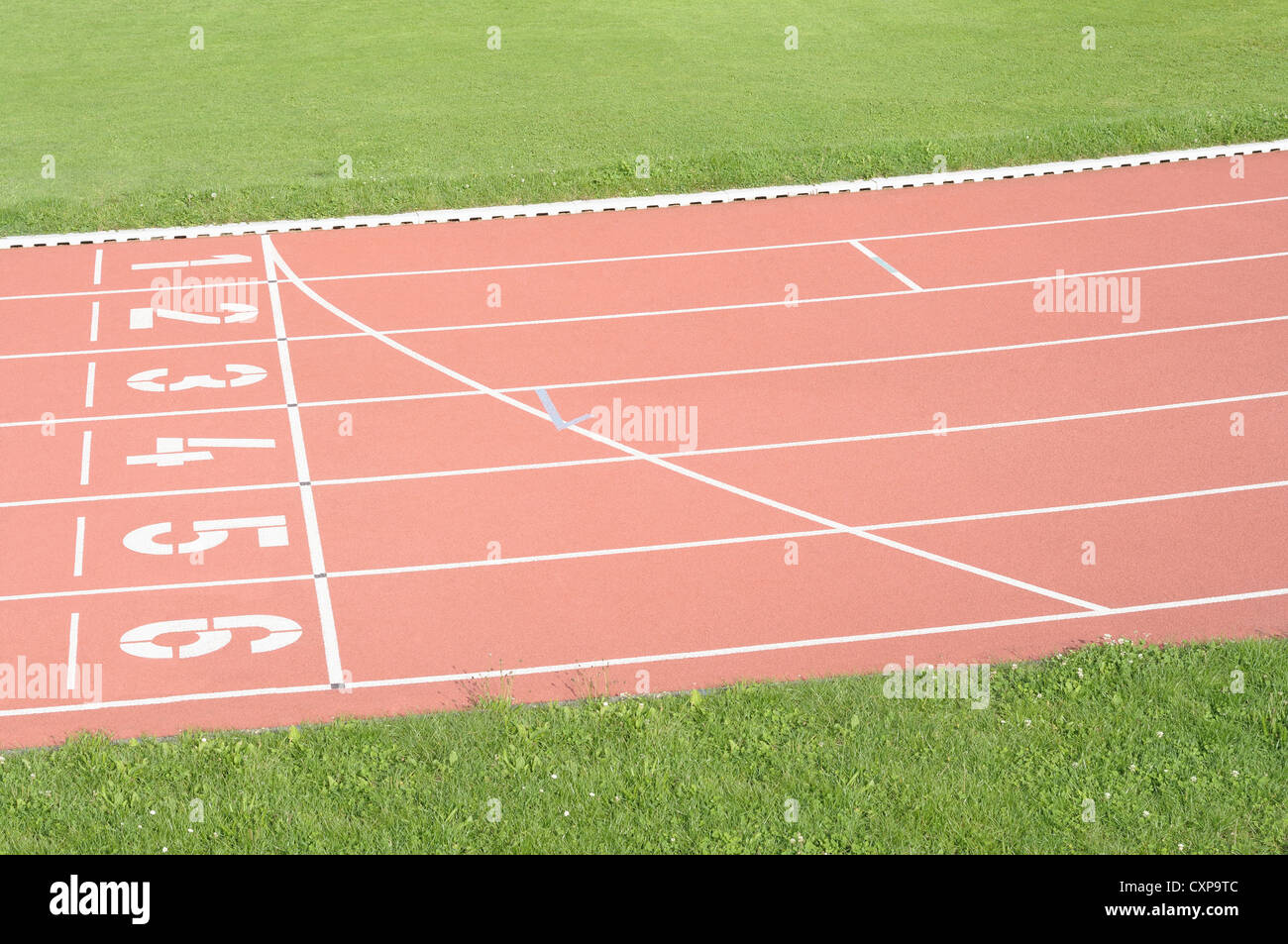 Athletic sports field running track starting line Stock Photo - Alamy