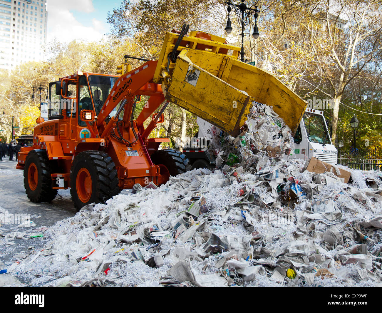 Sanitation workers cleaning up after a ticker tape parade in New York ...