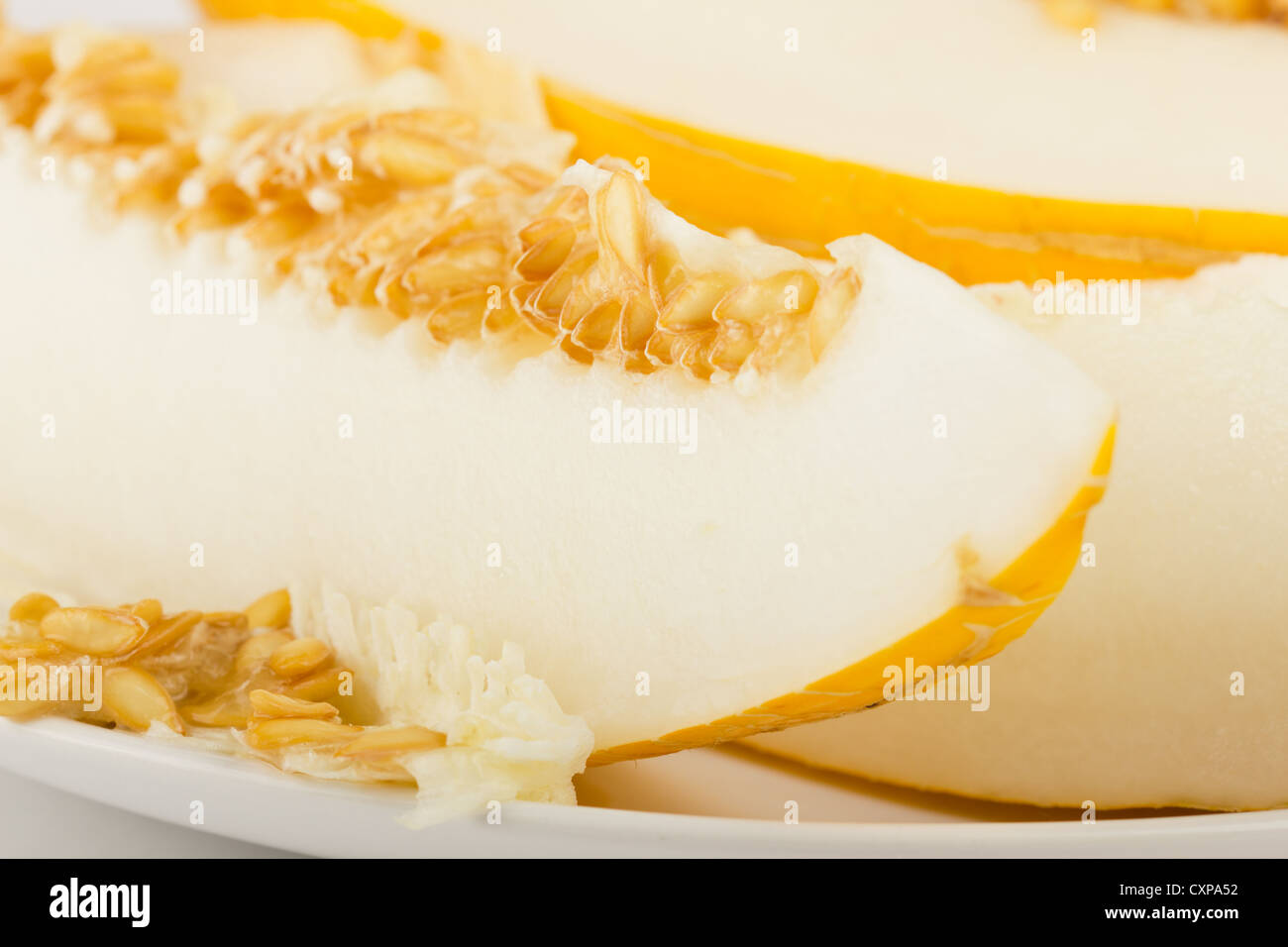 Cuts of ripe juicy melon fruit close-up Stock Photo - Alamy