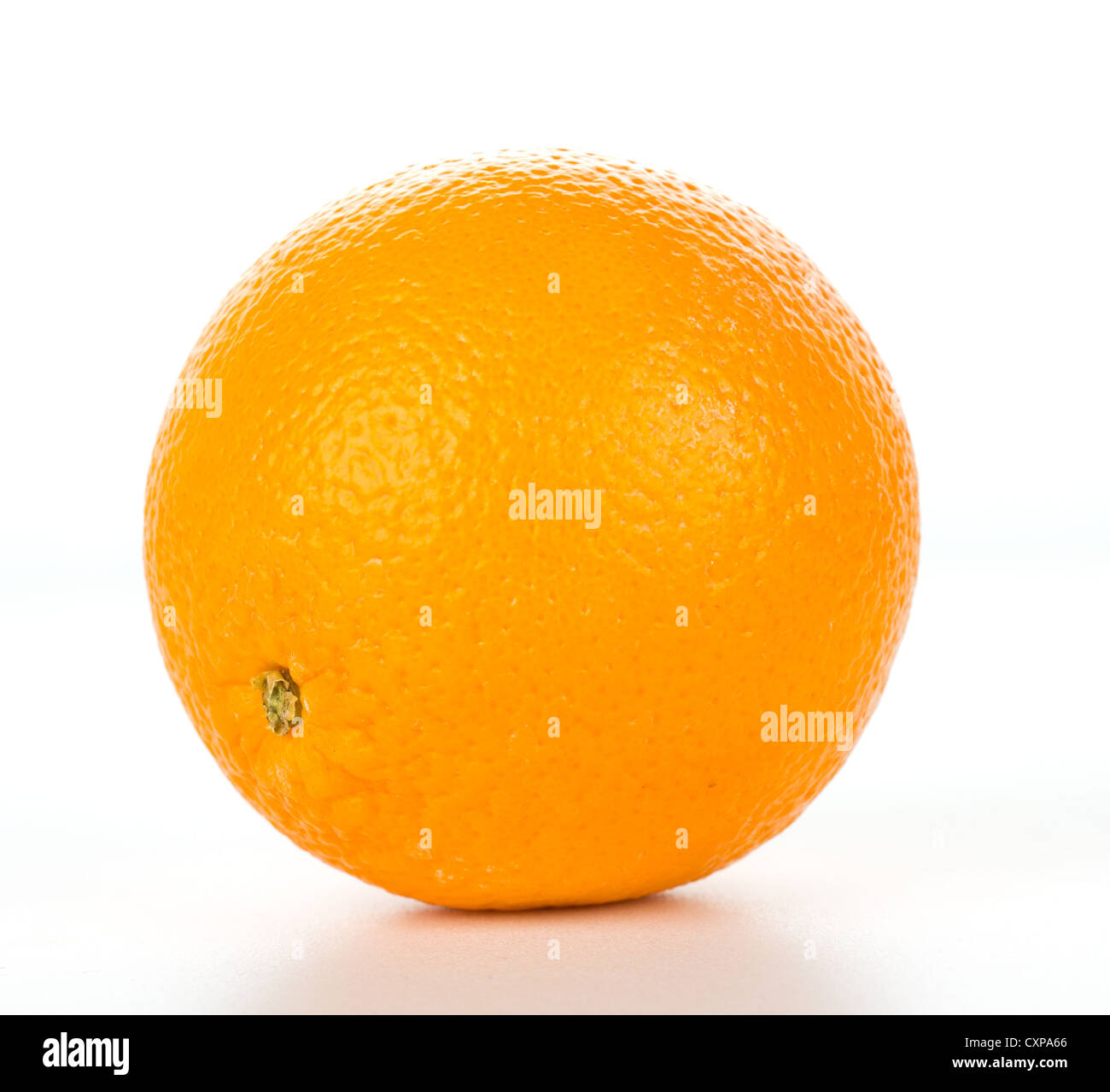 One orange fruit on white background Stock Photo - Alamy