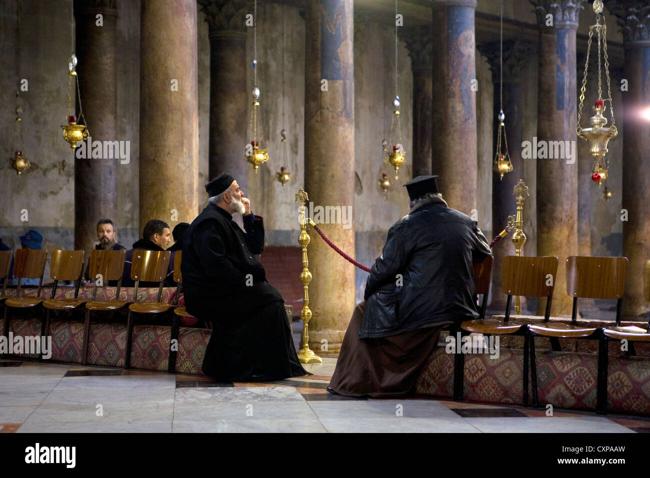 Orthodox priests in the Church of Nativity in Bethlehem, Palestine ...