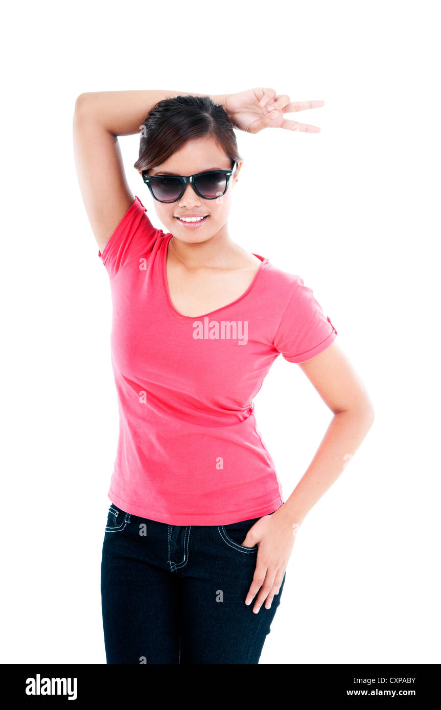 Young woman posing with peace sign,portrait Stock Photo - Alamy