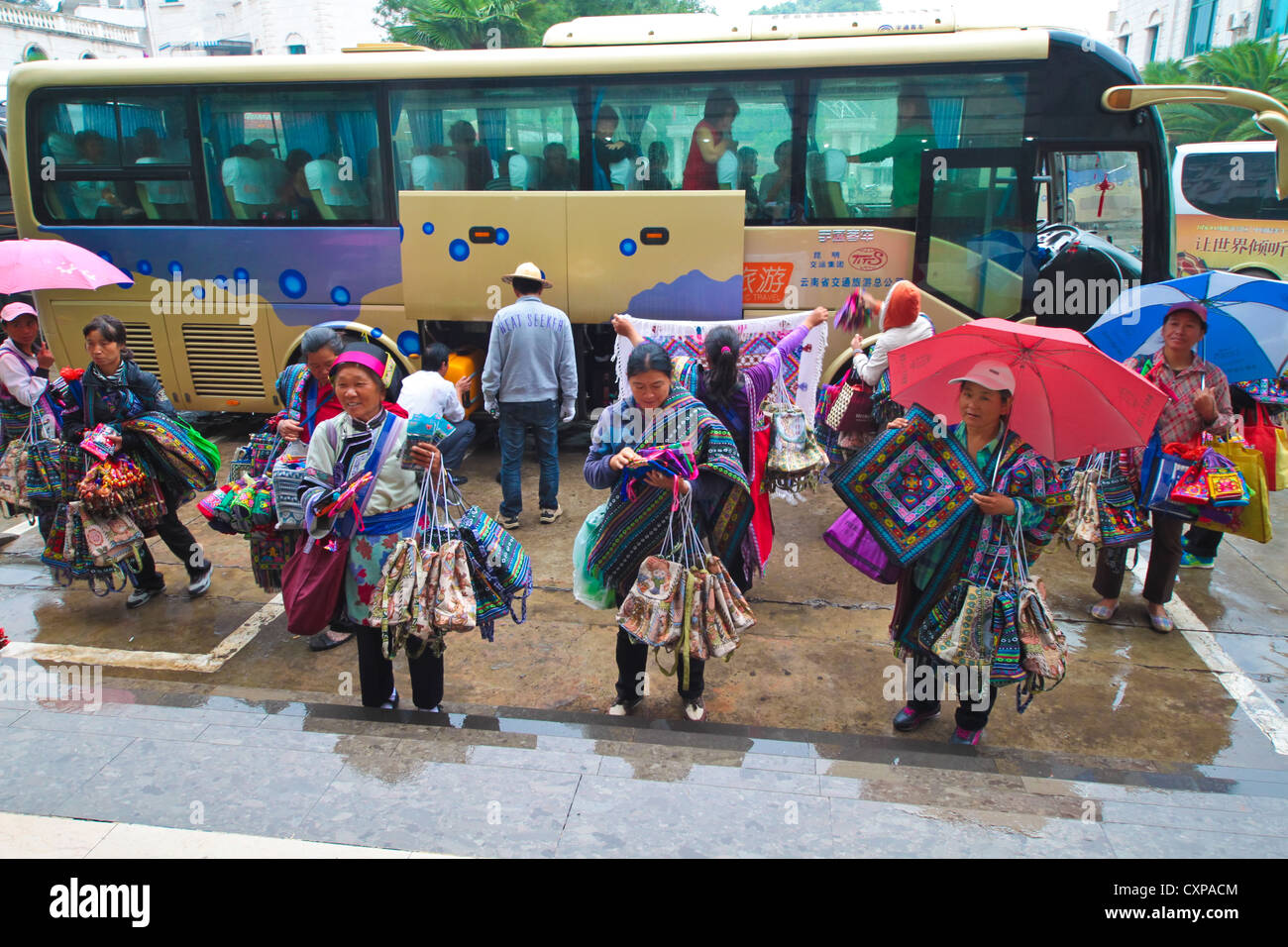 Petty traders offering their goods at the door step of a hotel Stock ...