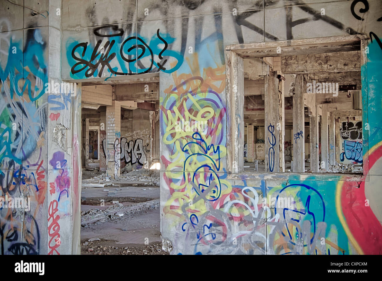 Graffiti on the interior of an abandoned factory in Detroit Michigan ...