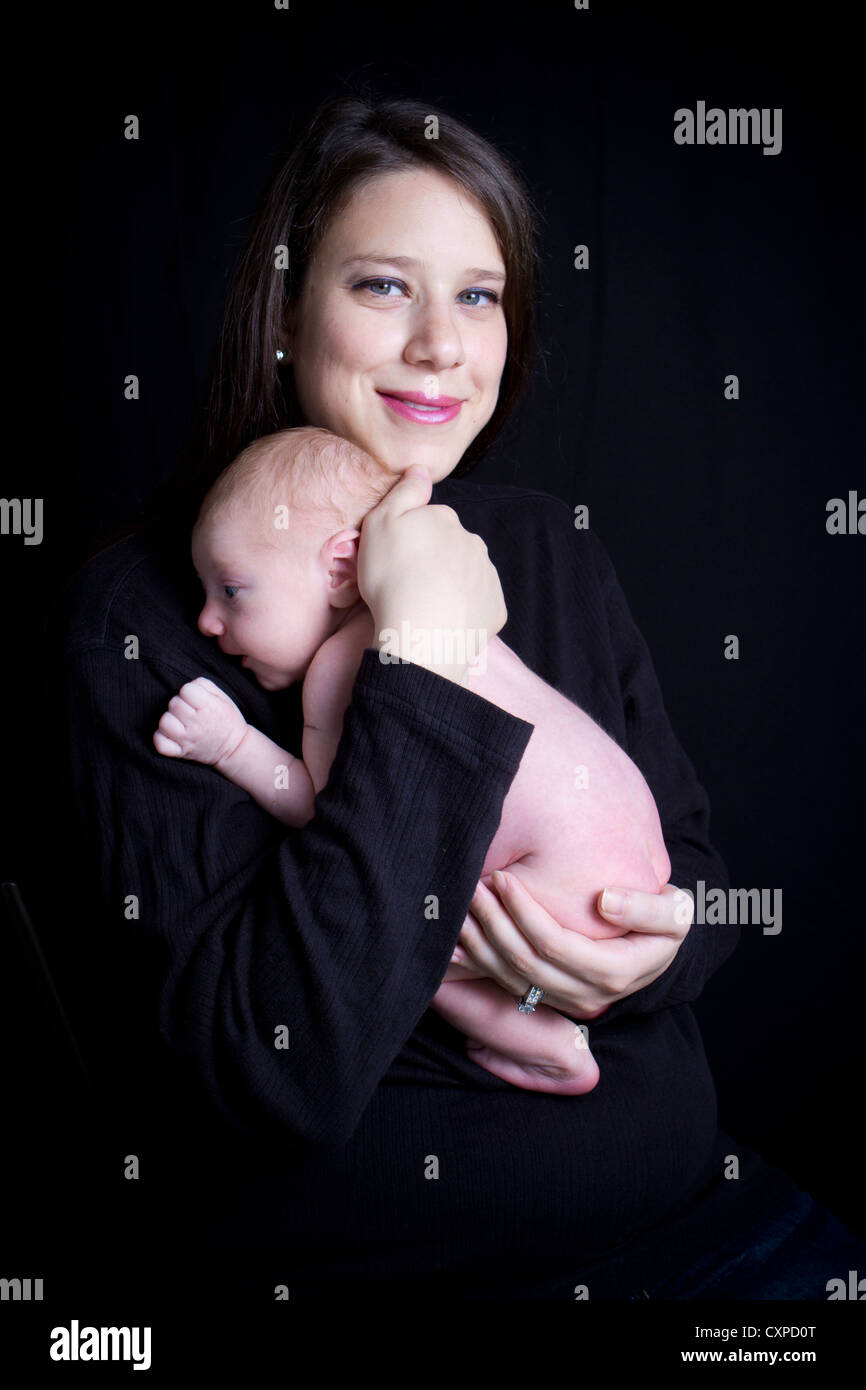 Mother with first born Stock Photo - Alamy