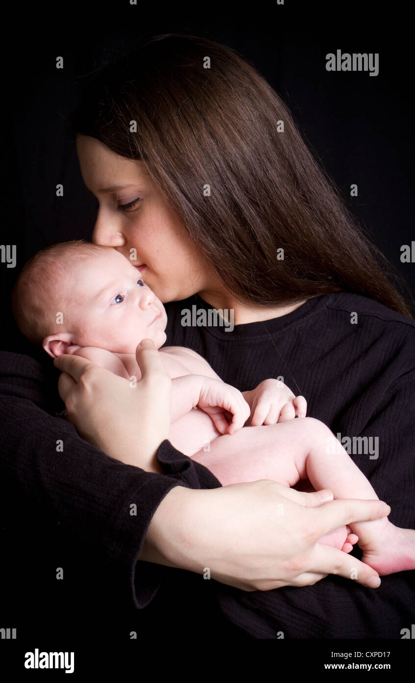Mother with first born Stock Photo - Alamy
