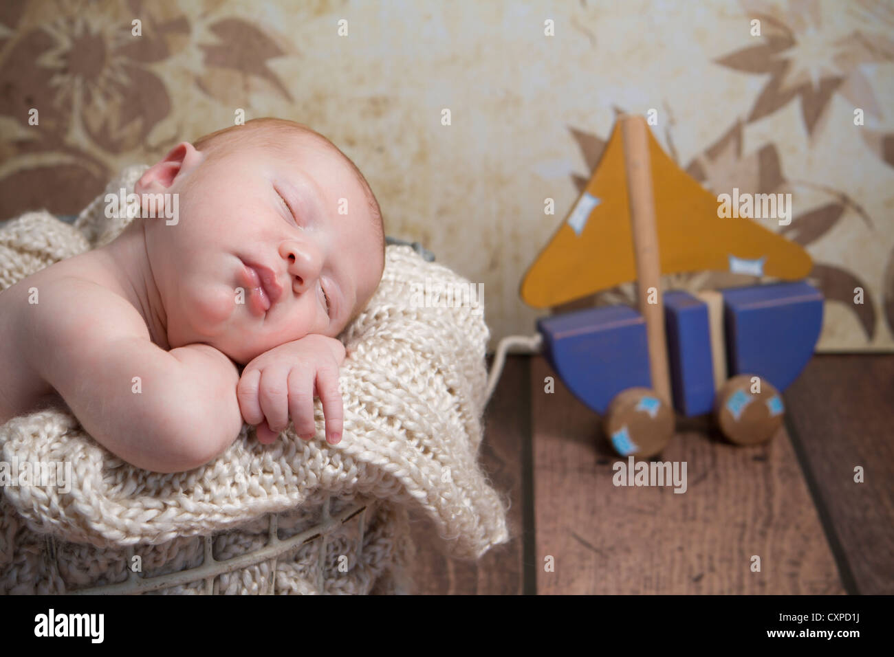Baby Boy dreaming of sailing Stock Photo - Alamy