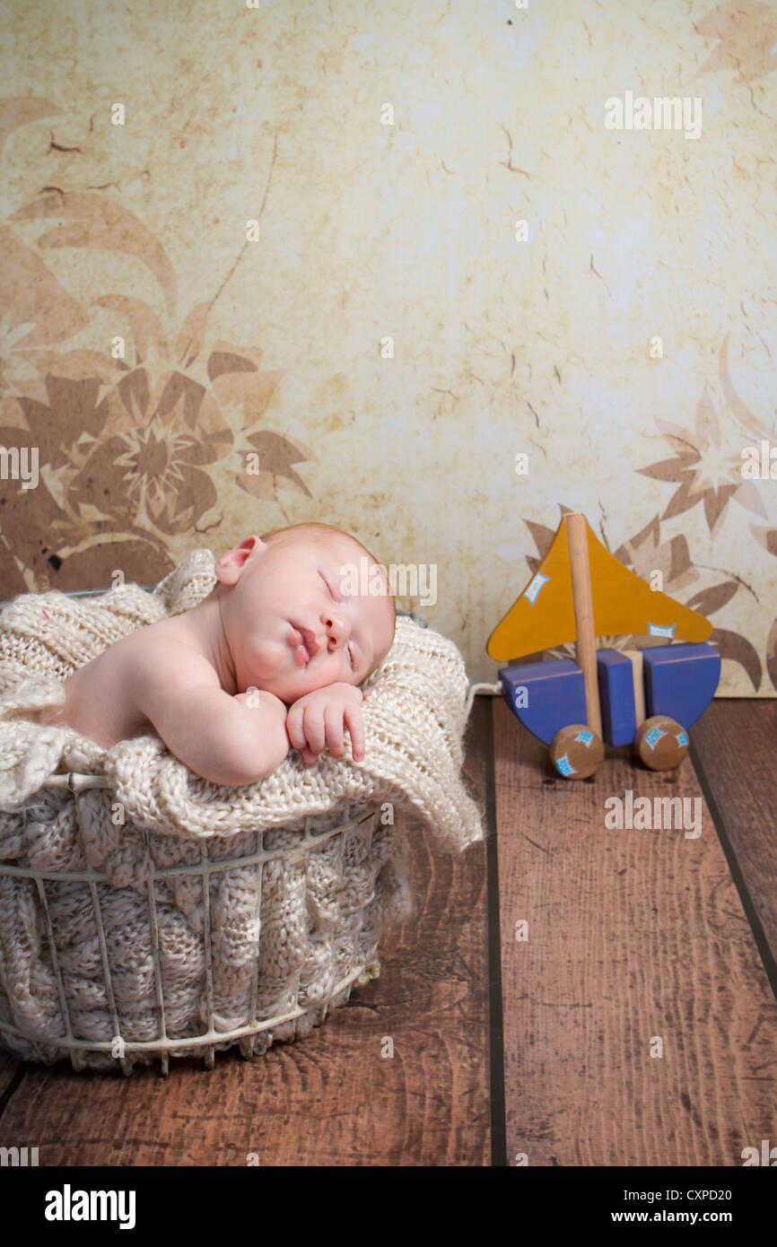 Baby Boy dreaming of sailing Stock Photo - Alamy