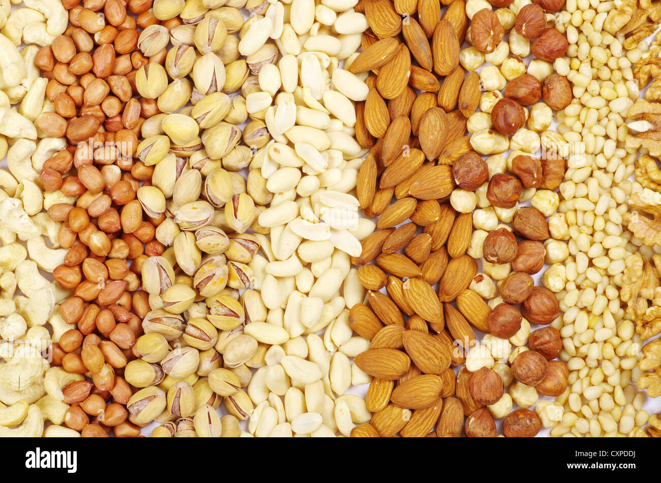 various nuts on a background Stock Photo - Alamy