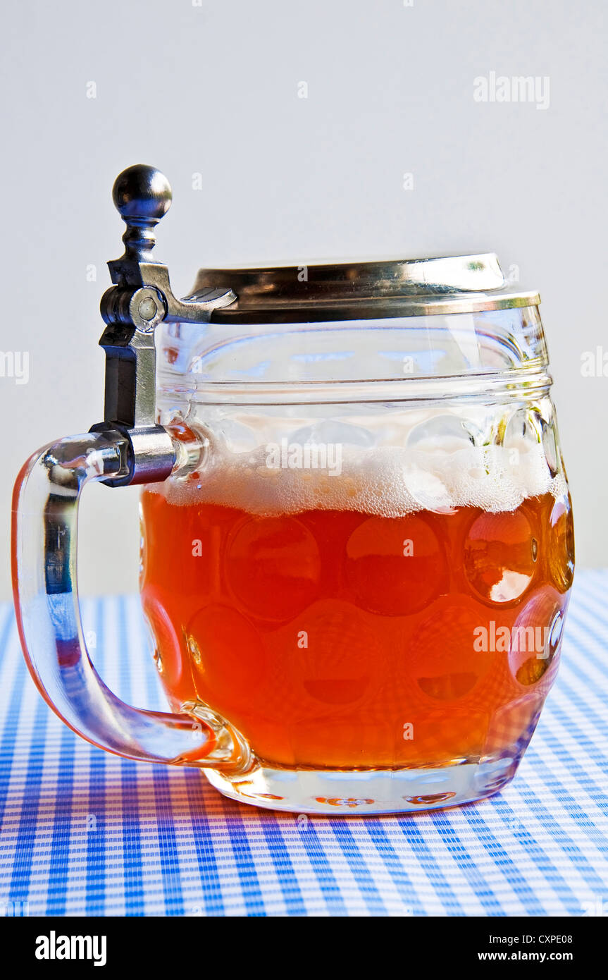 Beer on a blue-white desk Stock Photo - Alamy