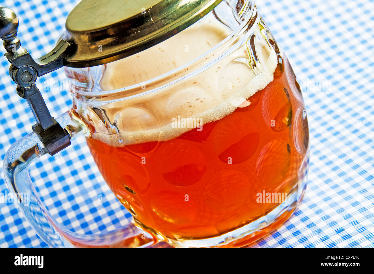 Beer on a blue-white desk Stock Photo - Alamy