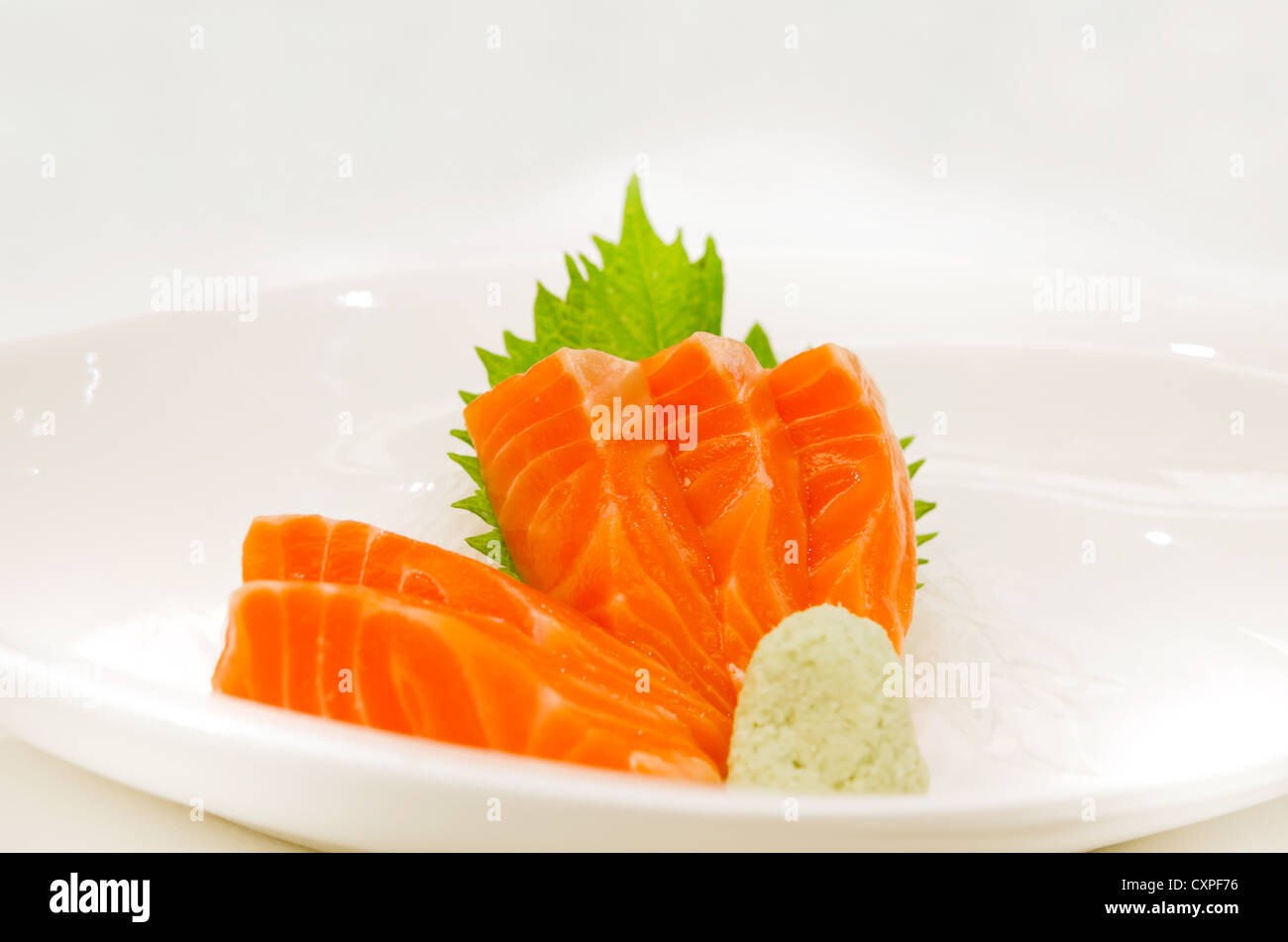 Salmon sashimi , sliced raw fatty salmon Stock Photo - Alamy