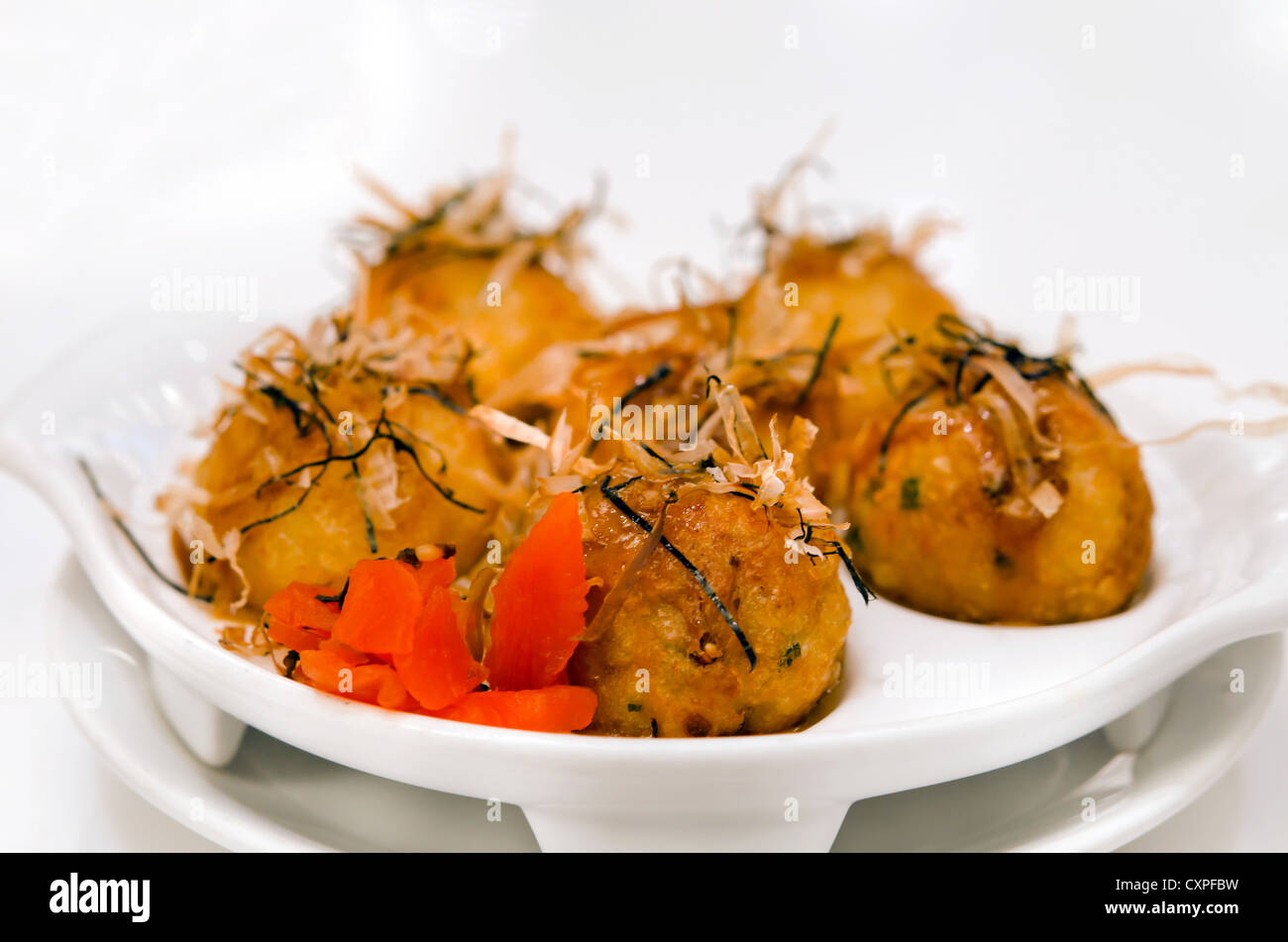 Takoyaki octopus balls - Japanese food Stock Photo - Alamy