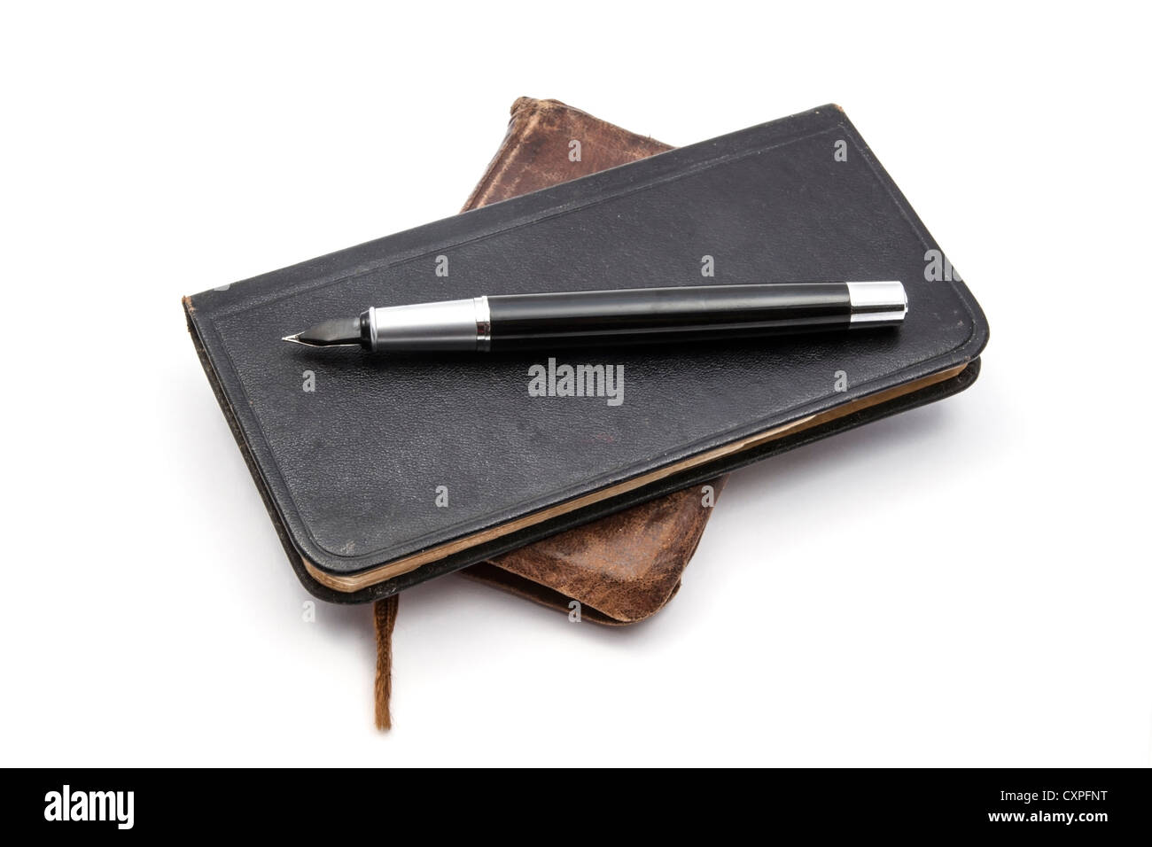 Old books and pen isolated on white background Stock Photo - Alamy