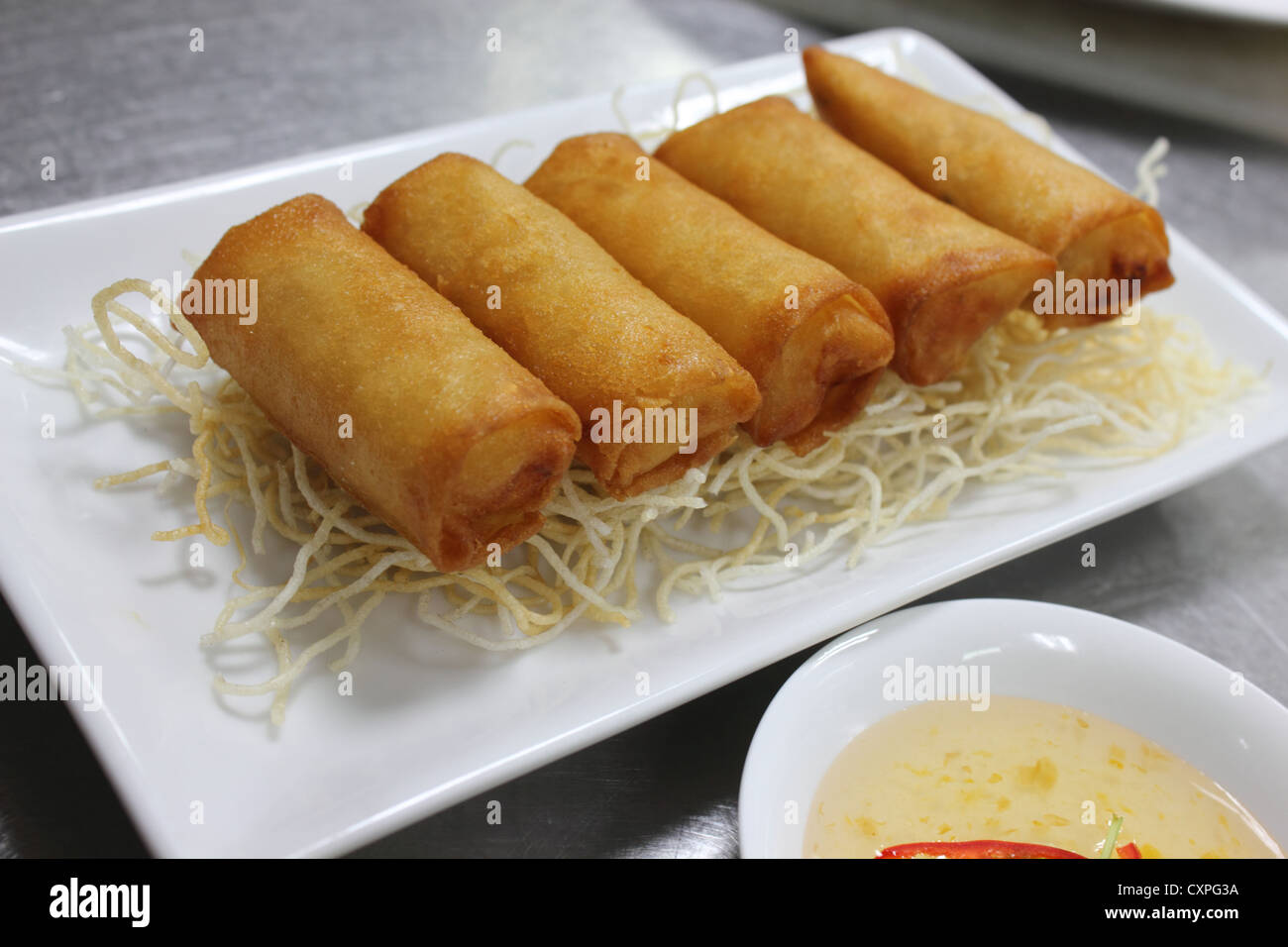 Deep fried spring rolls with sweet sauce Stock Photo - Alamy