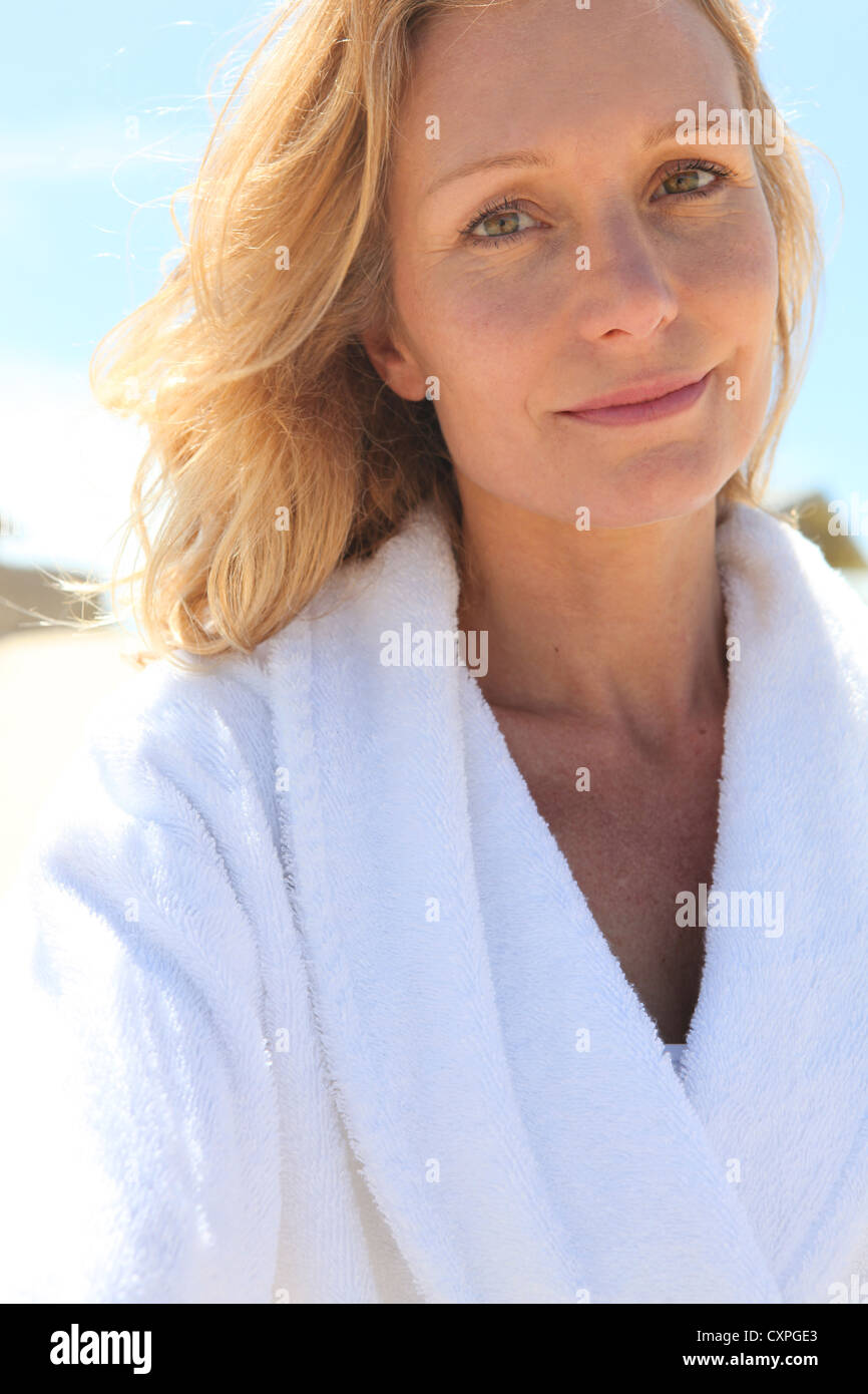 Woman wearing bath robe Stock Photo - Alamy