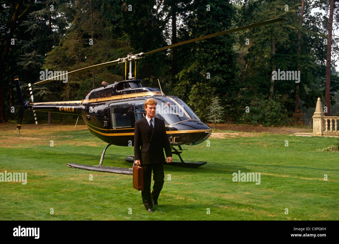 CEO businessman and helicopter Stock Photo - Alamy