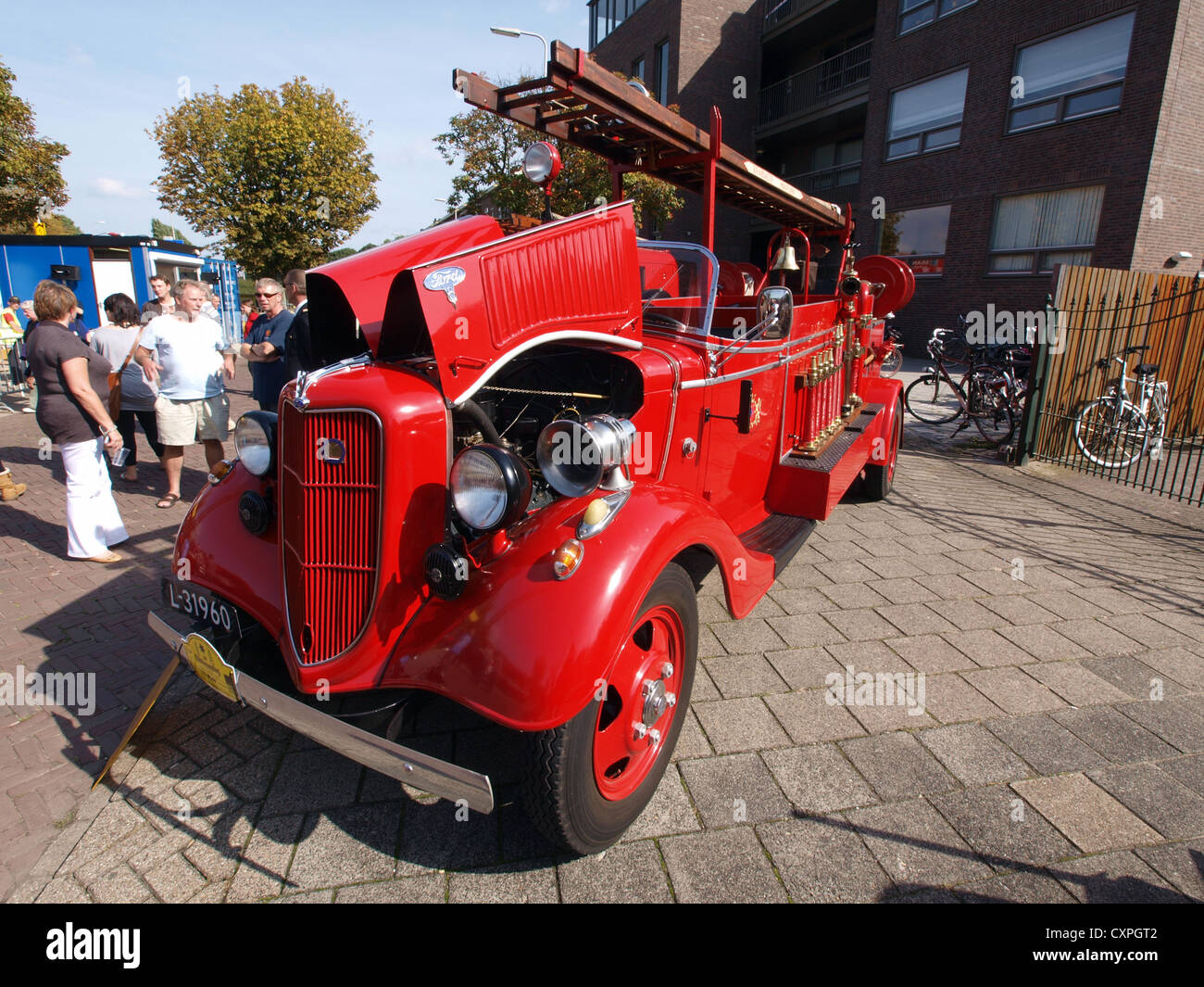 The Ford V8 fire engine truck is a vintage firefighting vehicle powered ...