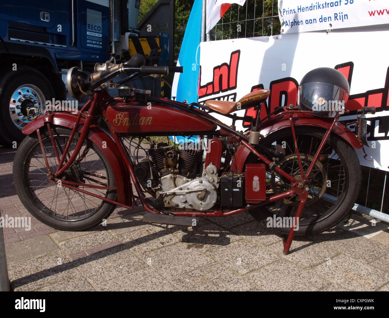 The Dark Red Indian motorcycle is a classic model known for its ...