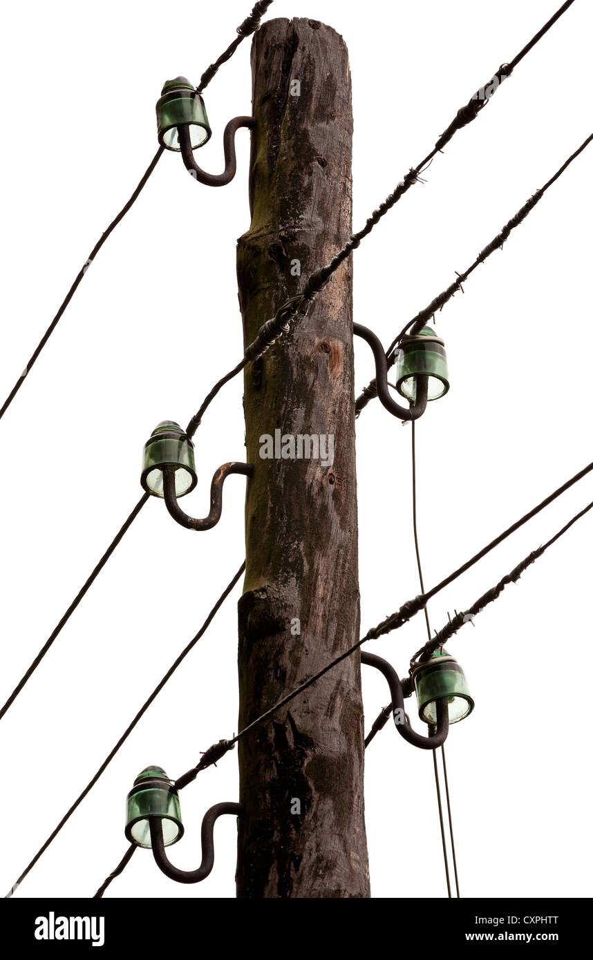 Wiring with isolators on an old rural electric pillar isolated on white ...