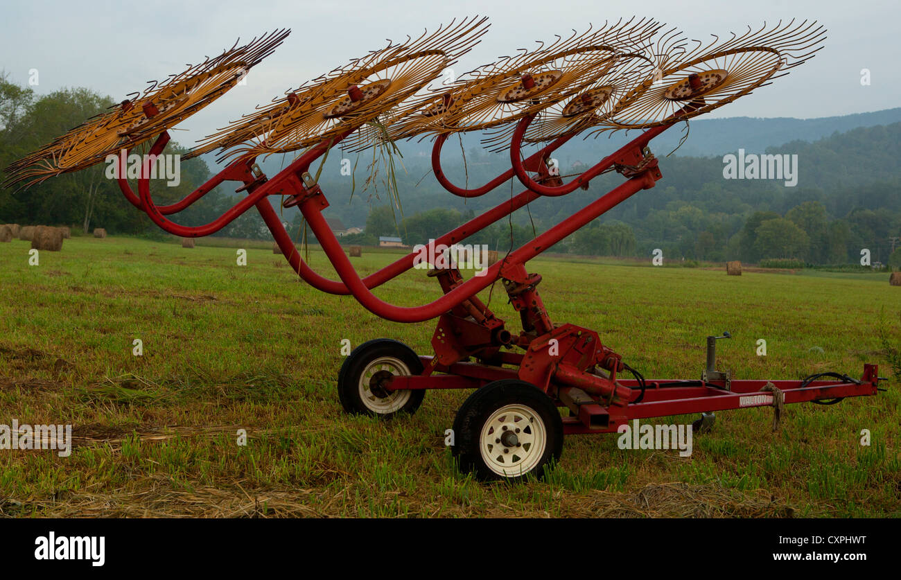 North America, USA, Tennessee, Sevier County. Tractor driven hay rake ...