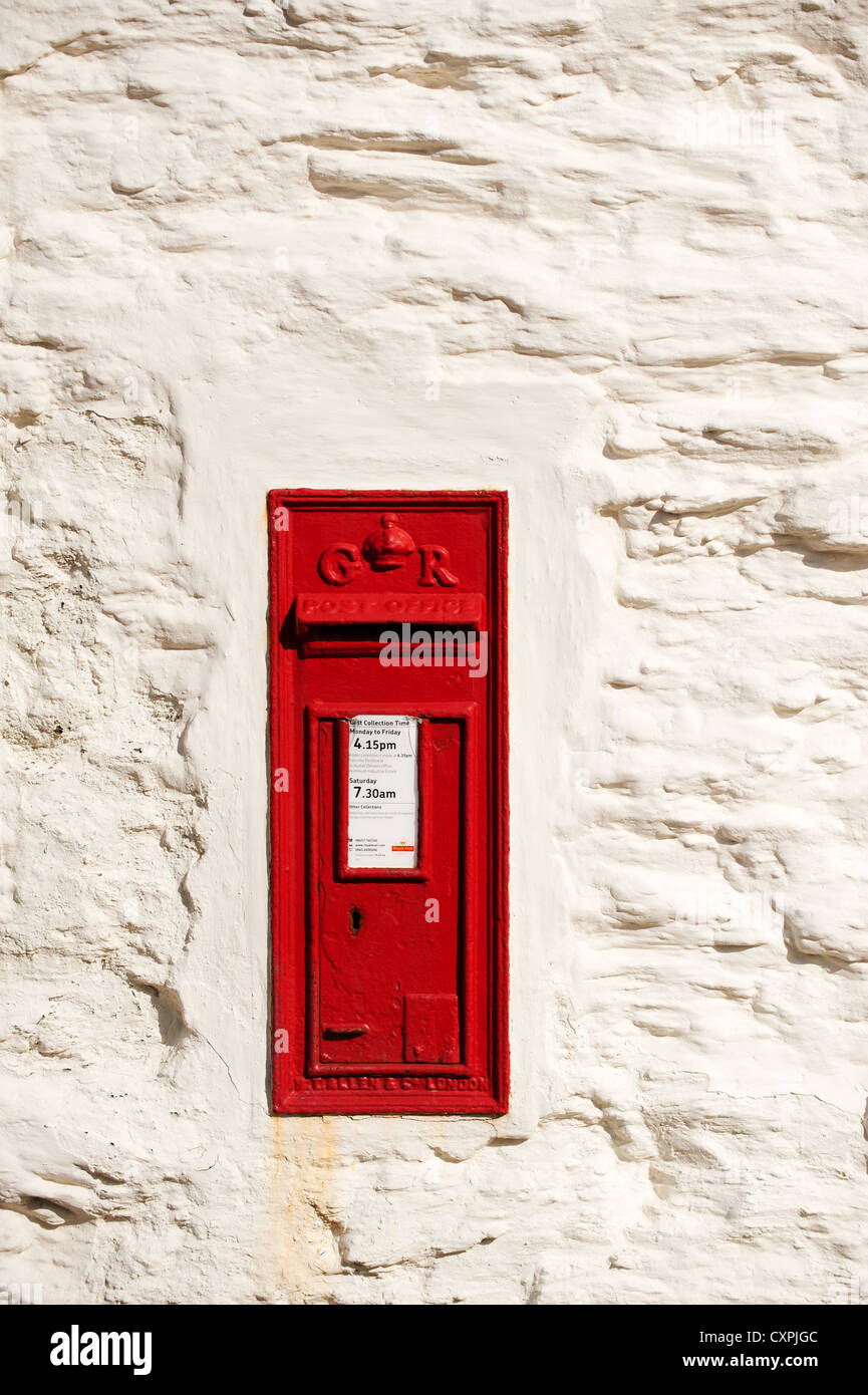 An old red post box in a wall Stock Photo - Alamy