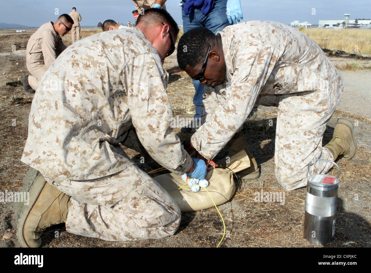 Sgt. Ryan Menke and Sgt. Keran Morrison, explosive ordnance disposal ...