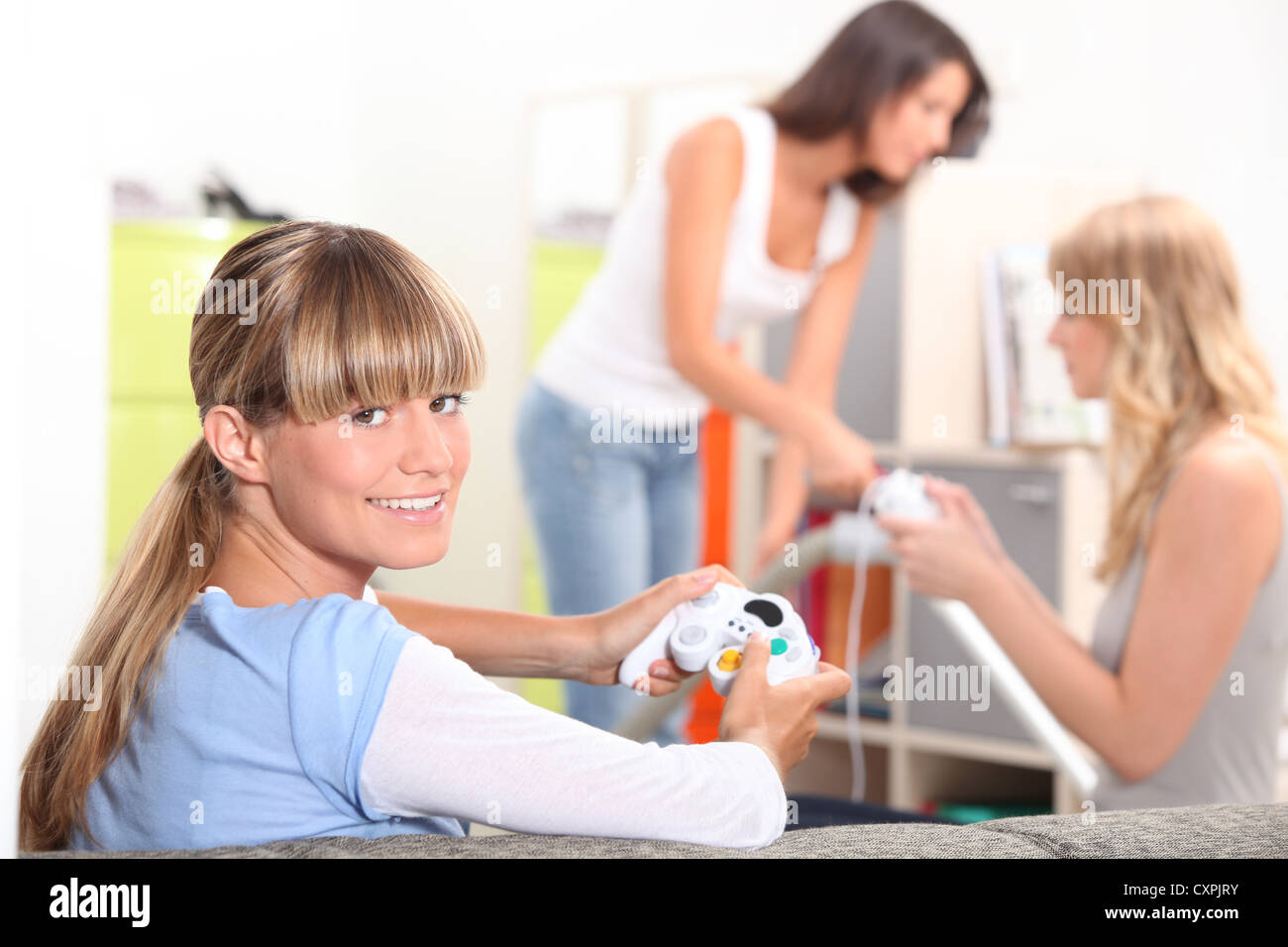 Girls playing computer games Stock Photo - Alamy