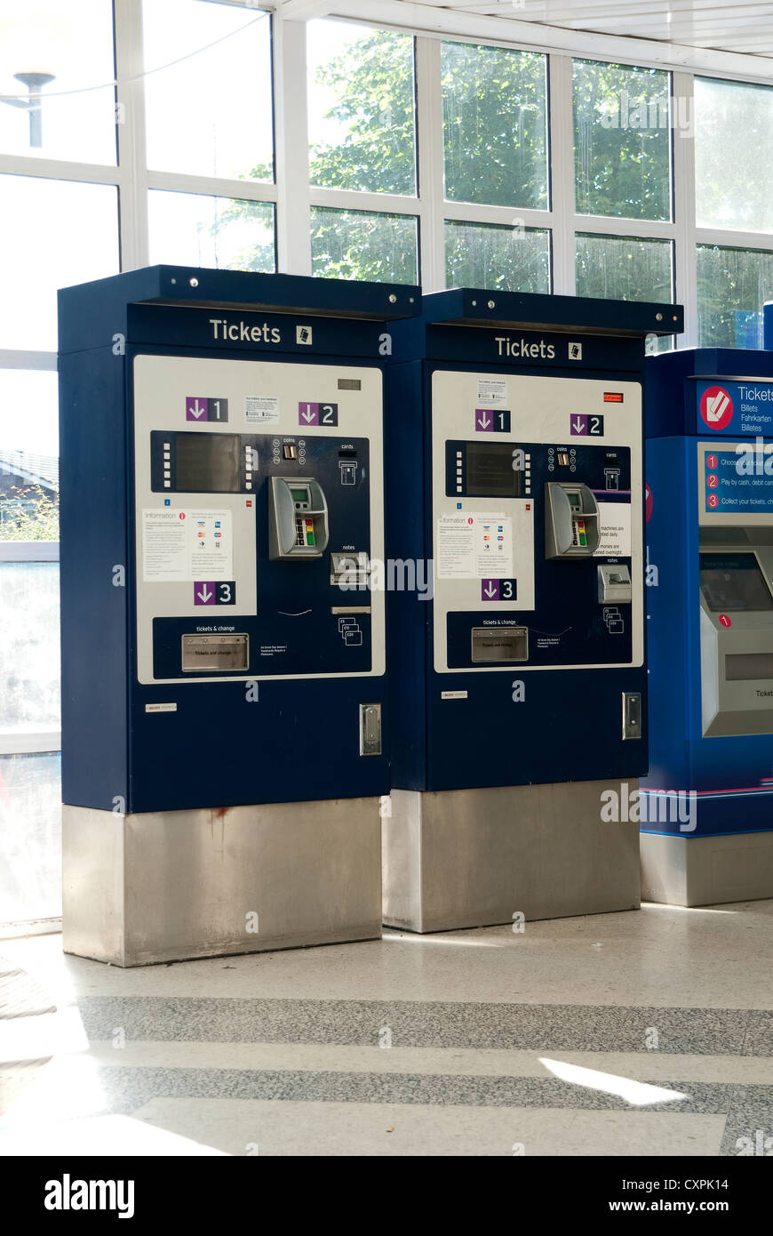 Ticket machines in the concourse area of a railway station in England ...