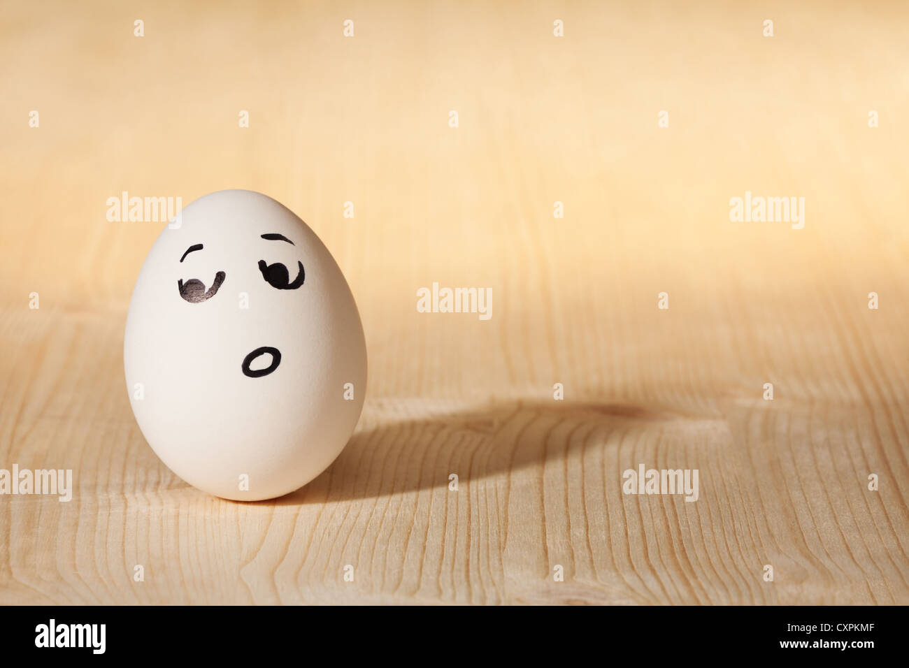 white egg with confused worried drawn facial expression Stock Photo - Alamy
