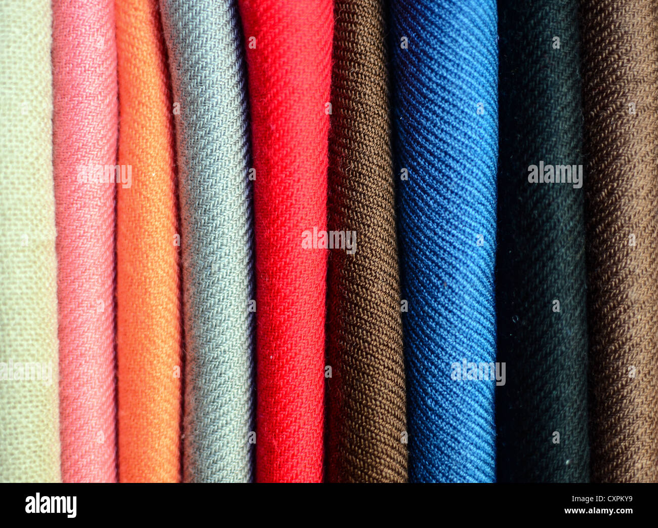 Colorful textiles background Stock Photo - Alamy