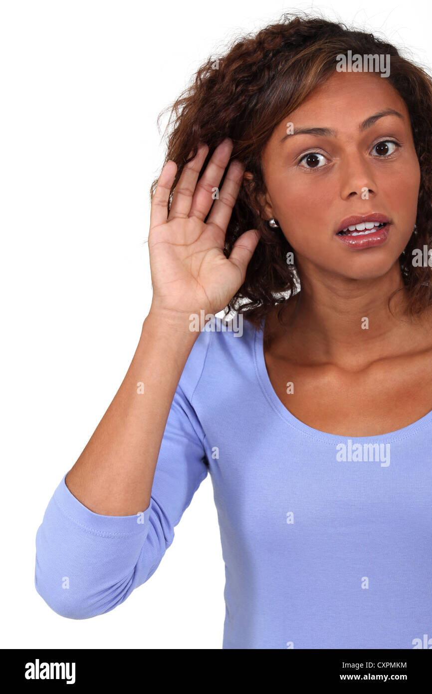 Woman straining ear hi-res stock photography and images - Alamy