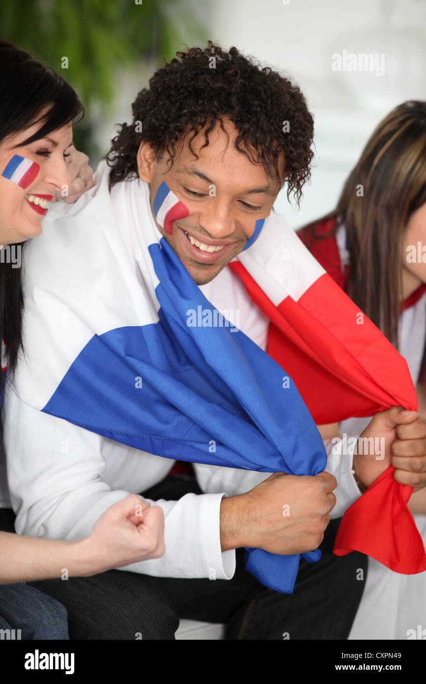 Female french soccer fan holding hi-res stock photography and images ...
