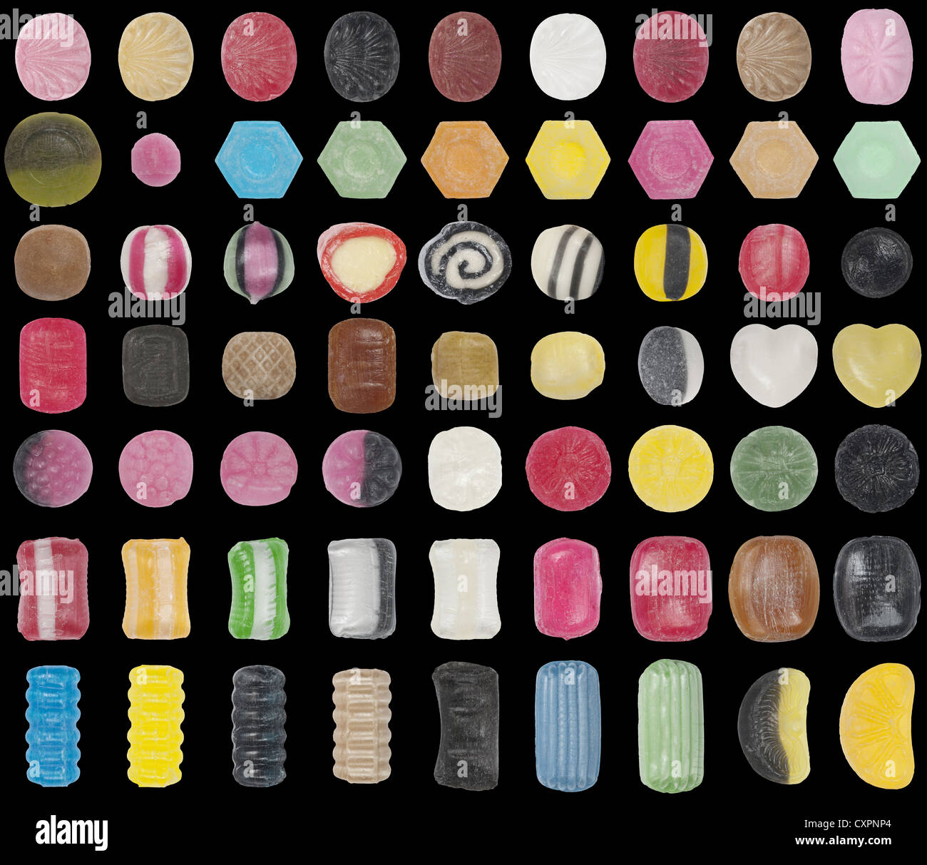 63 kinds of hard candy isolated with hard edges on a black background ...