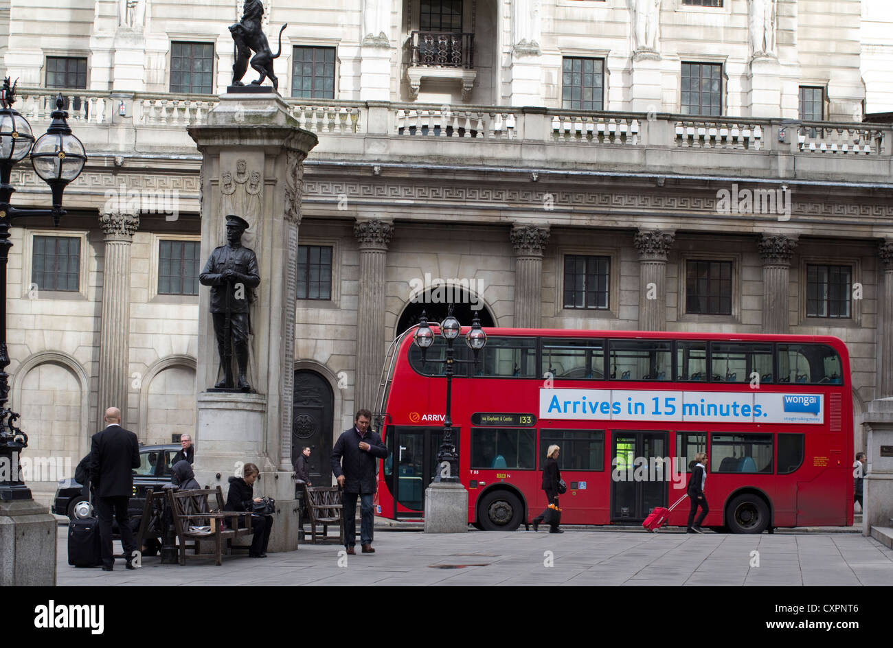 A red London double-decker bus featuring a Wonga advertisement with the ...