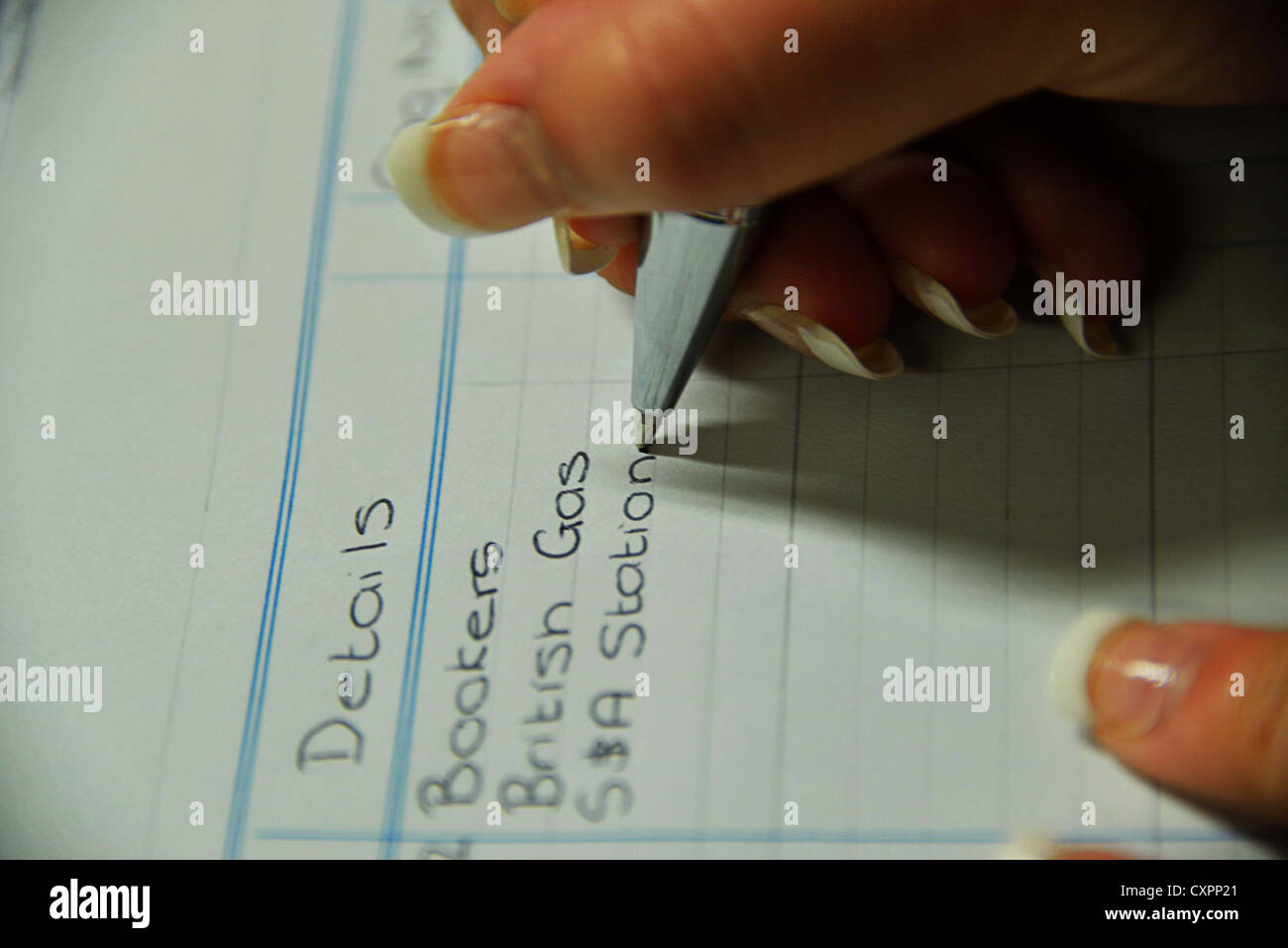 Handwriting in cash book Stock Photo - Alamy