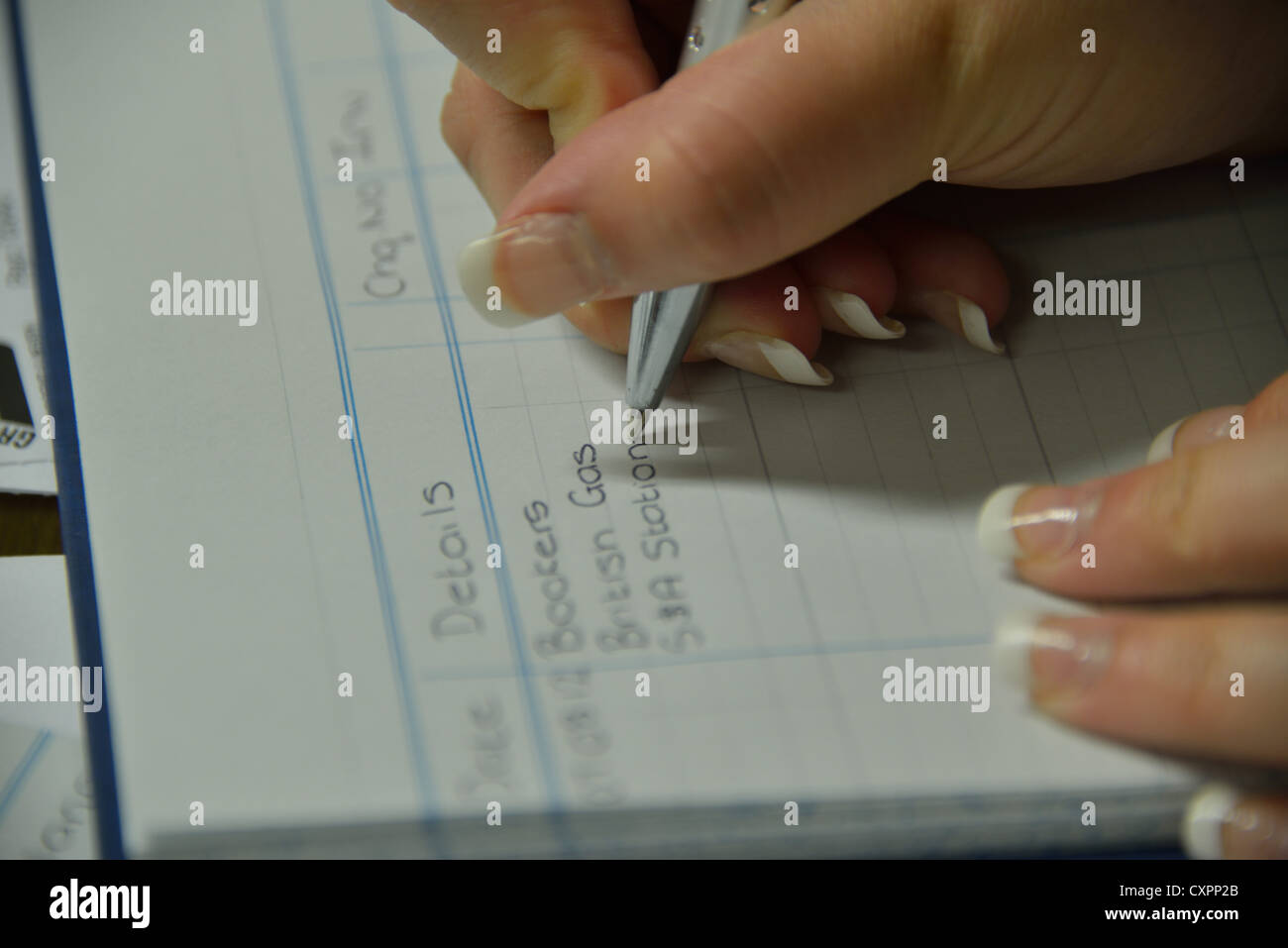 Handwriting in cash book Stock Photo - Alamy