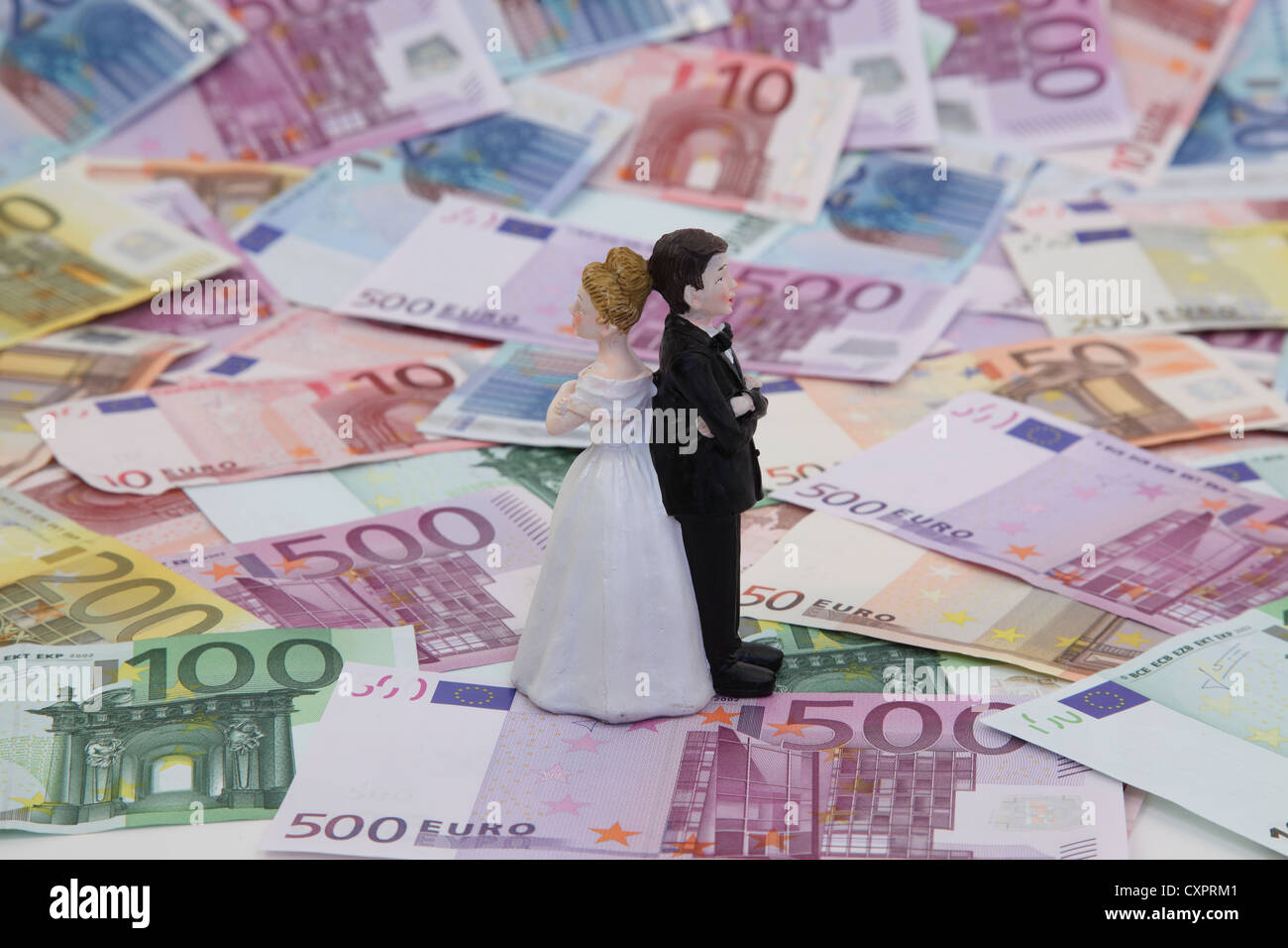 Bridal Couple and Money Stock Photo - Alamy