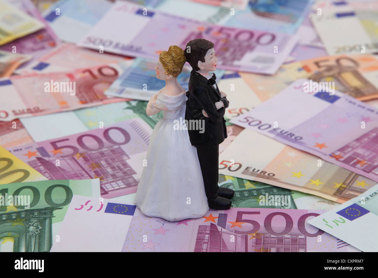 Bridal Couple and Money Stock Photo - Alamy
