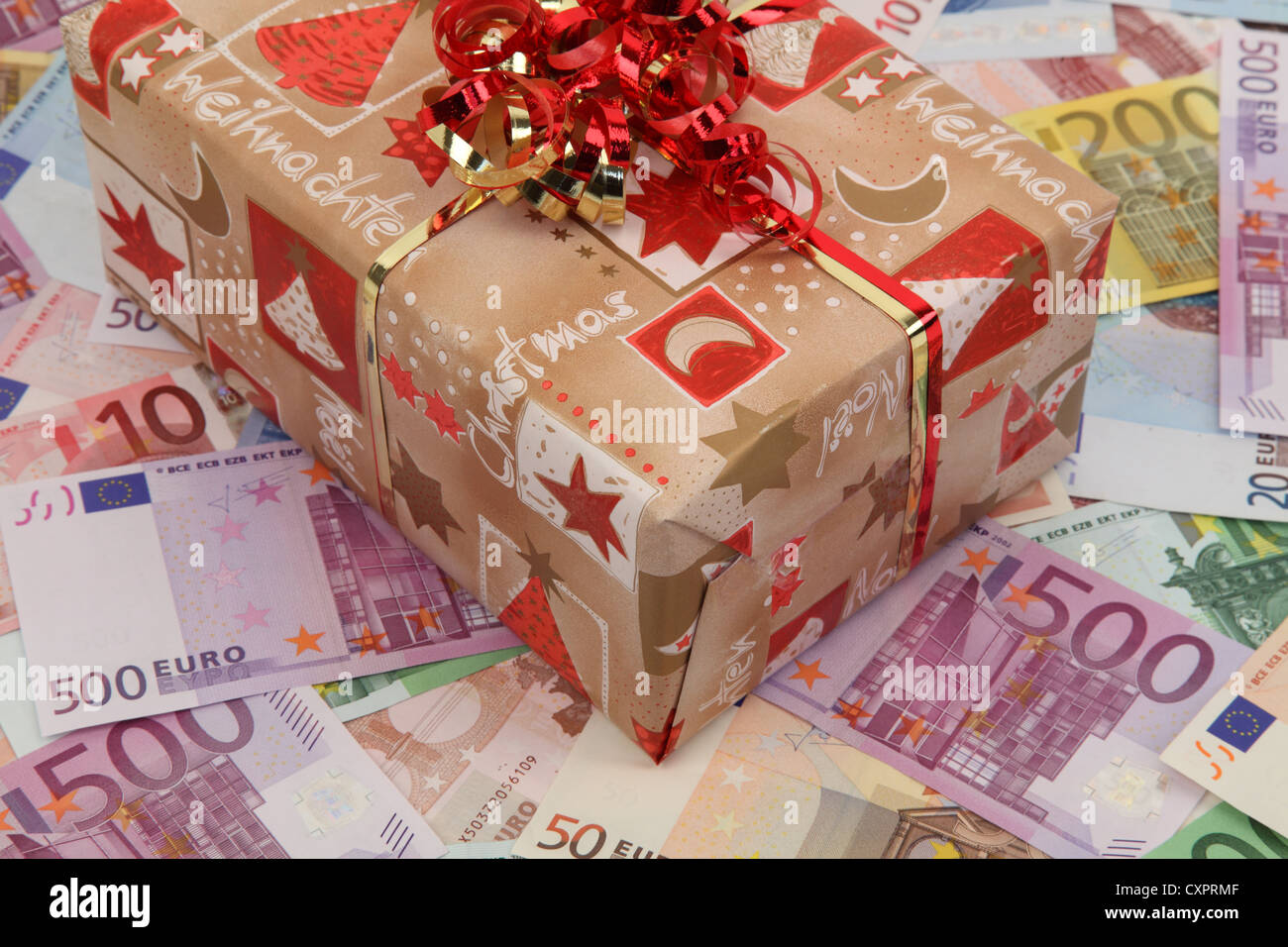 Present and Money Stock Photo - Alamy