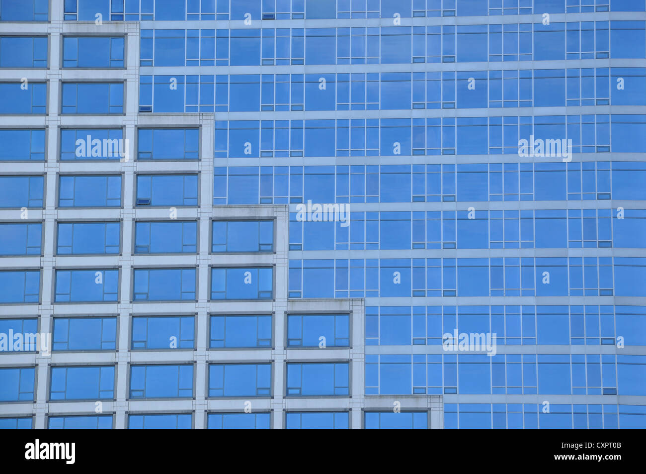 Blue business building window Stock Photo - Alamy