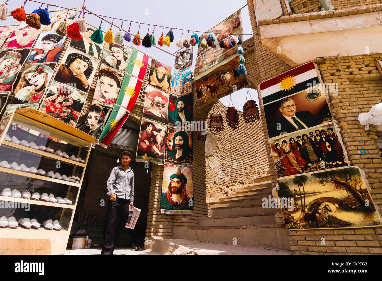 Shop displaying tapestries with Christian, Muslim and nationalist ...