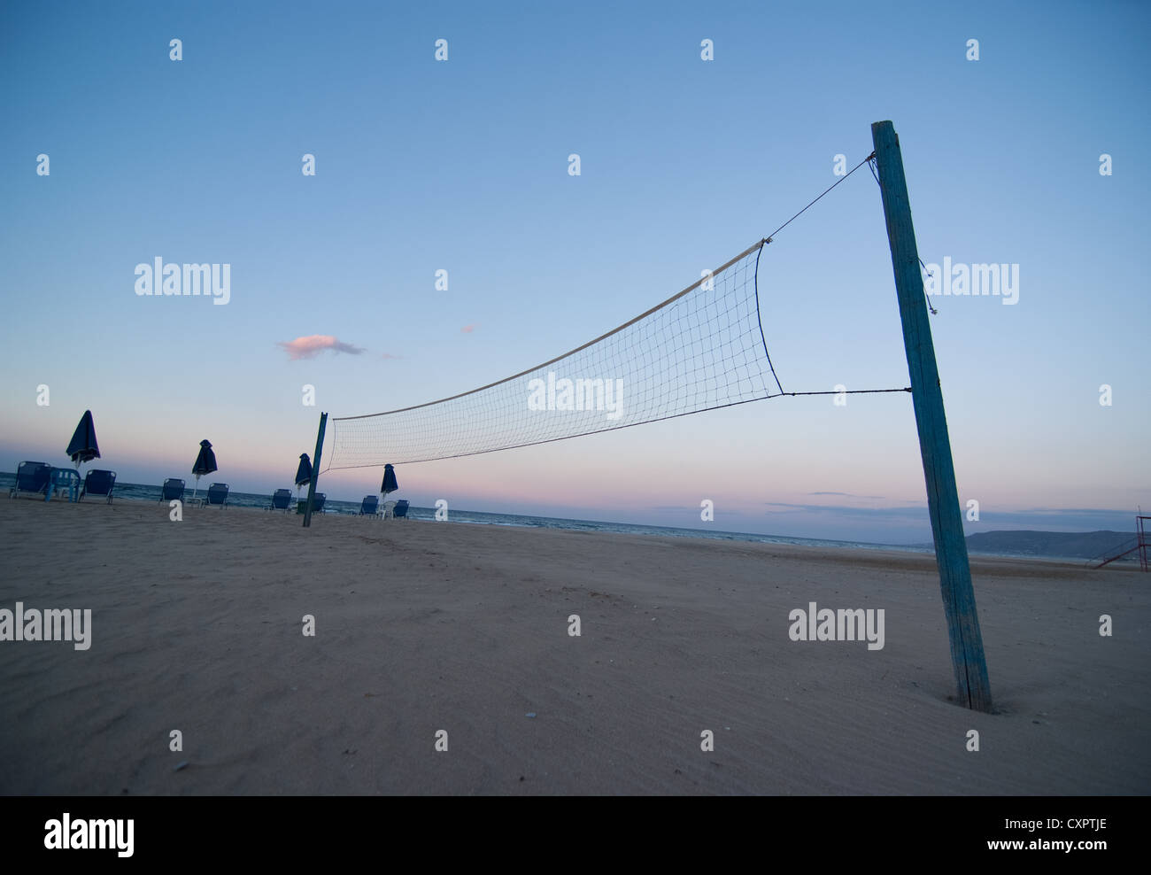 As the sun goes down a empty beach volleyball pitch Geogioupolis beach ...