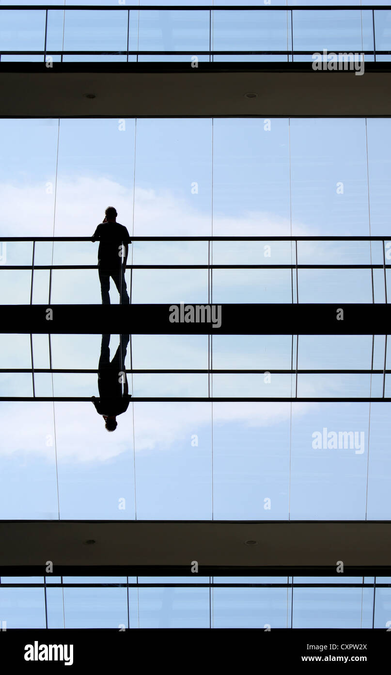 young man inside a modern office building Stock Photo - Alamy