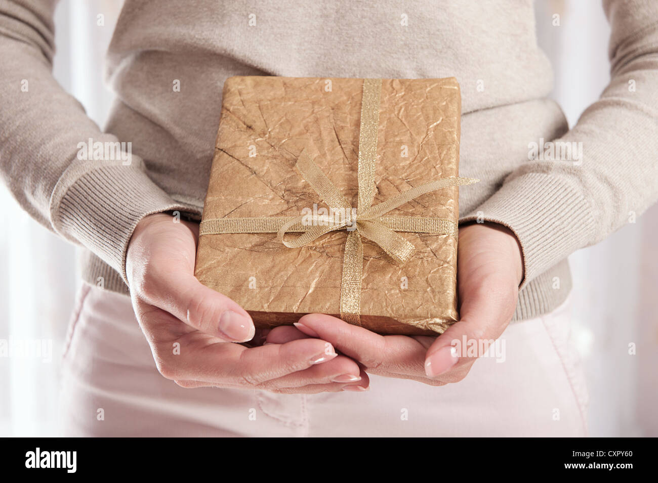 Book wrapped in ribbon hi-res stock photography and images - Alamy