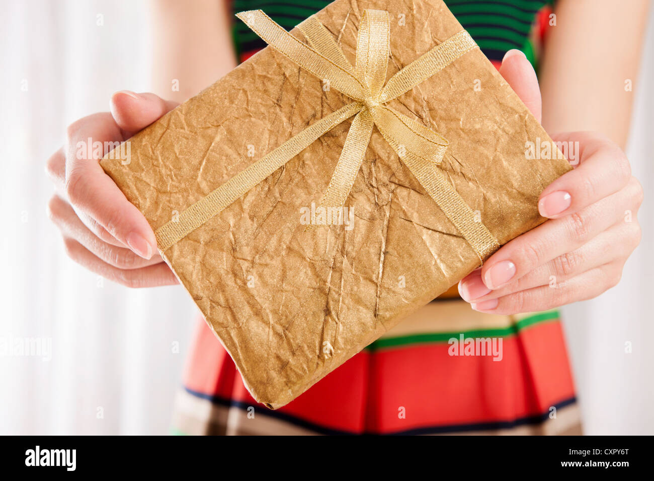 Book wrapped in ribbon hi-res stock photography and images - Alamy