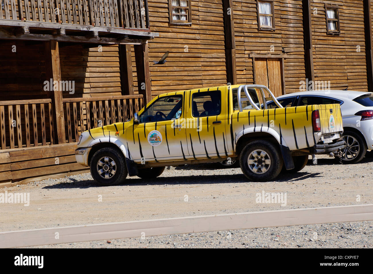 Western town. Yellow off road car on activity at La Reserva Sevilla ...